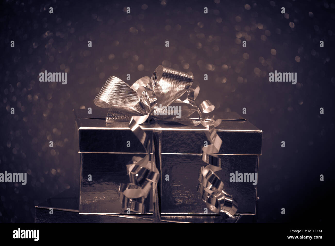 A shiny gift box in darker tones, giving the retro feeling Stock Photo ...