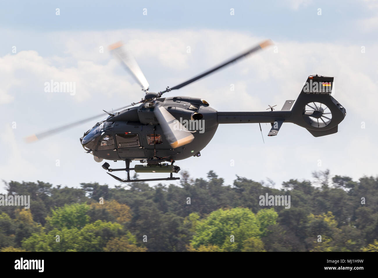 BERLIN - APR 27, 2018: New Airbus H145M military helicopter performing at the Berlin ILA Air ...