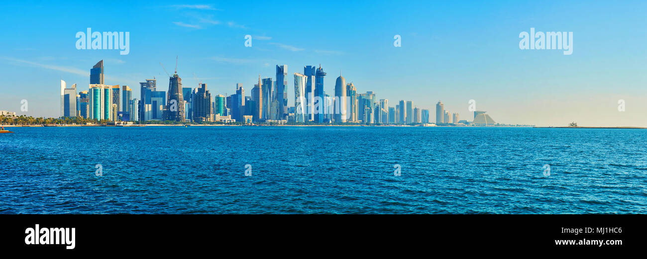 The skyline of West Bay with numerous modern fast growing skyscrapers ...