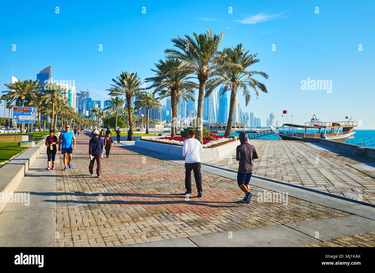 Qatar doha corniche promenade people hi-res stock photography and ...