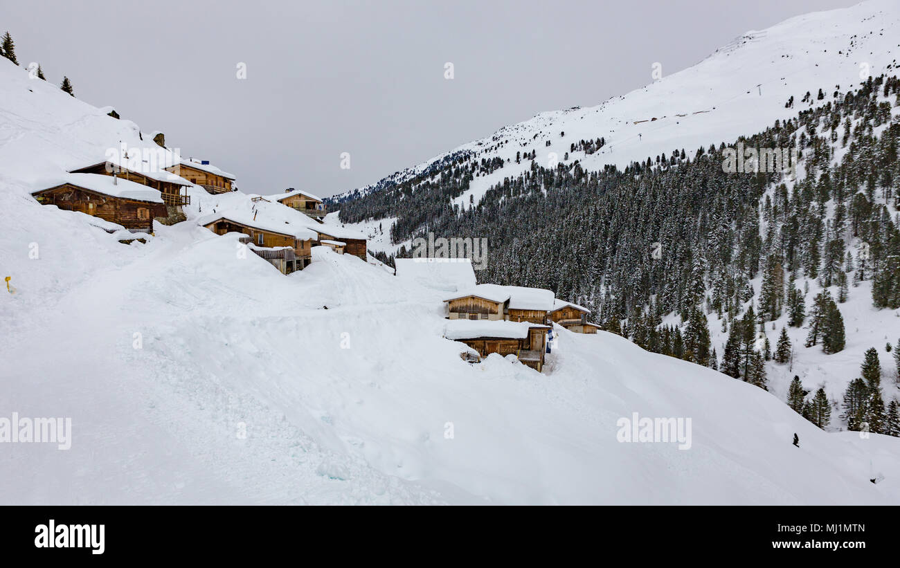 Alpine house covered with snow hi-res stock photography and images - Alamy