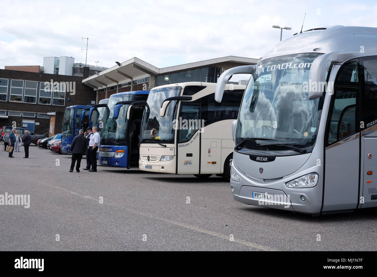 May 2018 - Line of buses and coaches in Exeter bus station before it is ...