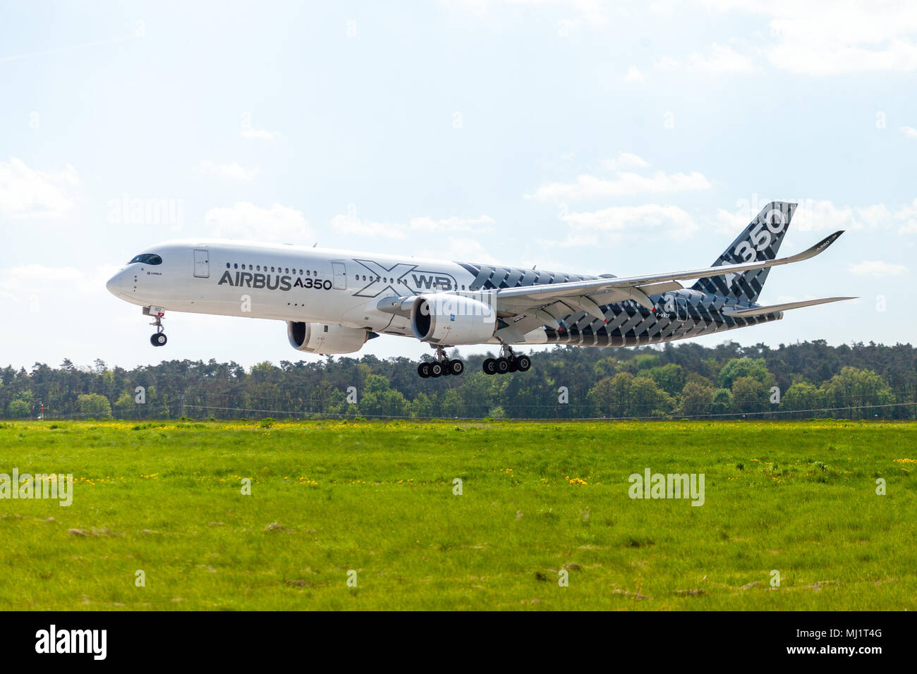 BERLIN / GERMANY - APRIL 28, 2018: Airbus A350 XWB plane flies at ...
