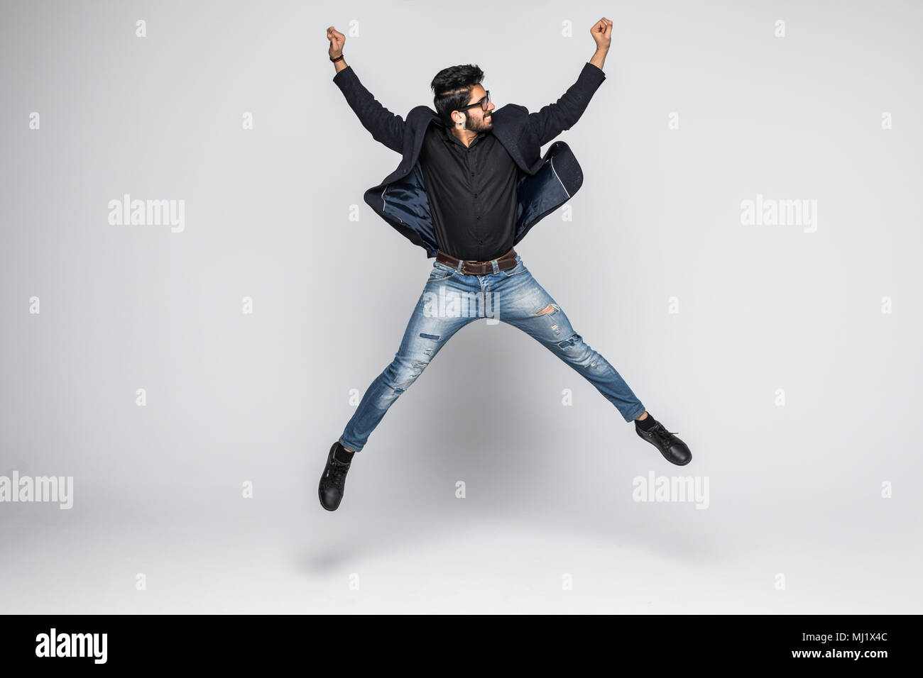 Indian man jumping hi-res stock photography and images - Alamy