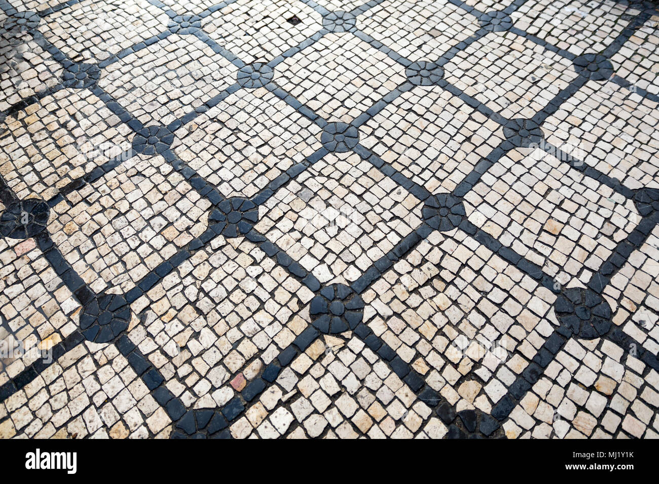 Portuguese traditional cobblestone pavement in hi-res stock photography ...