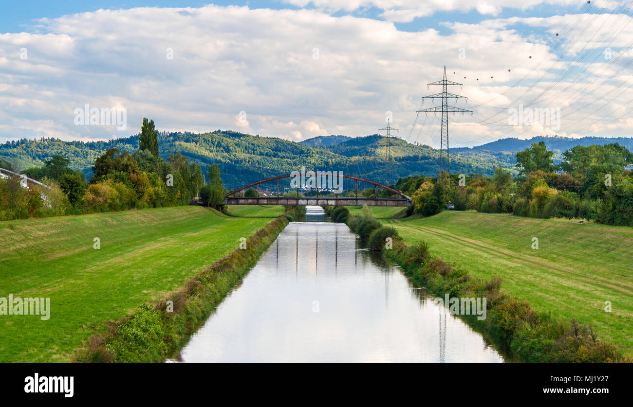 Kinzig river and Black Forest mountains in Offenburg, Germany Stock ...