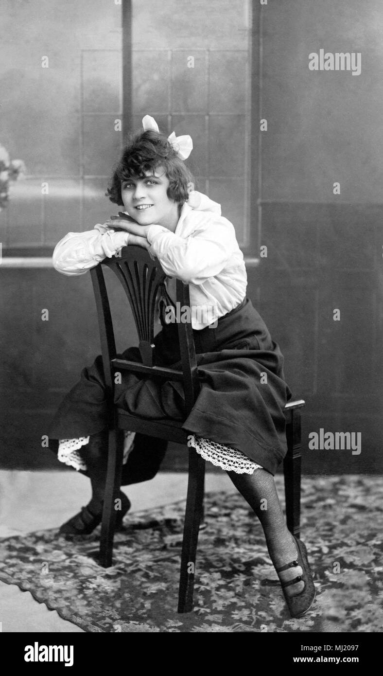 Sitting with legs apart hi-res stock photography and images - Alamy