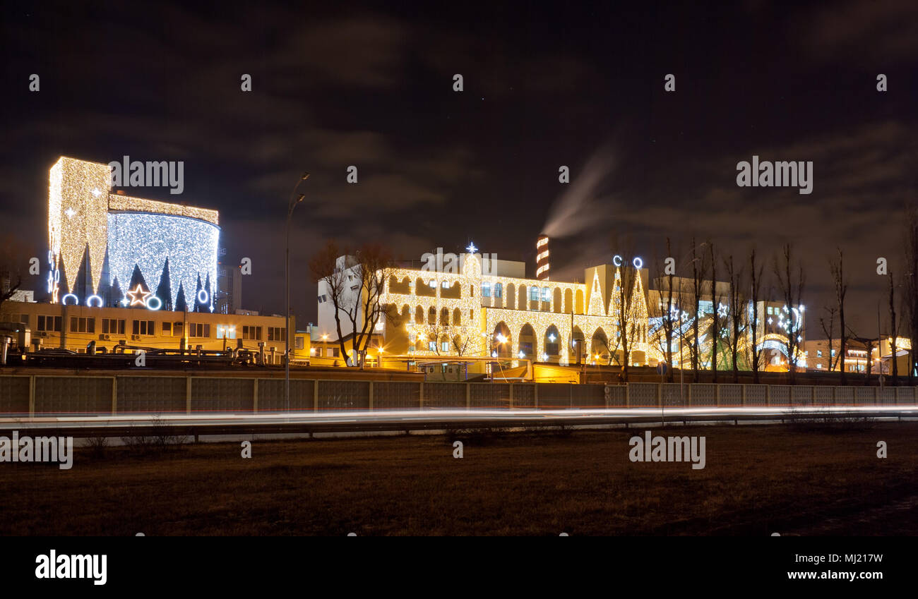 Sweet factory illuminated Stock Photo - Alamy