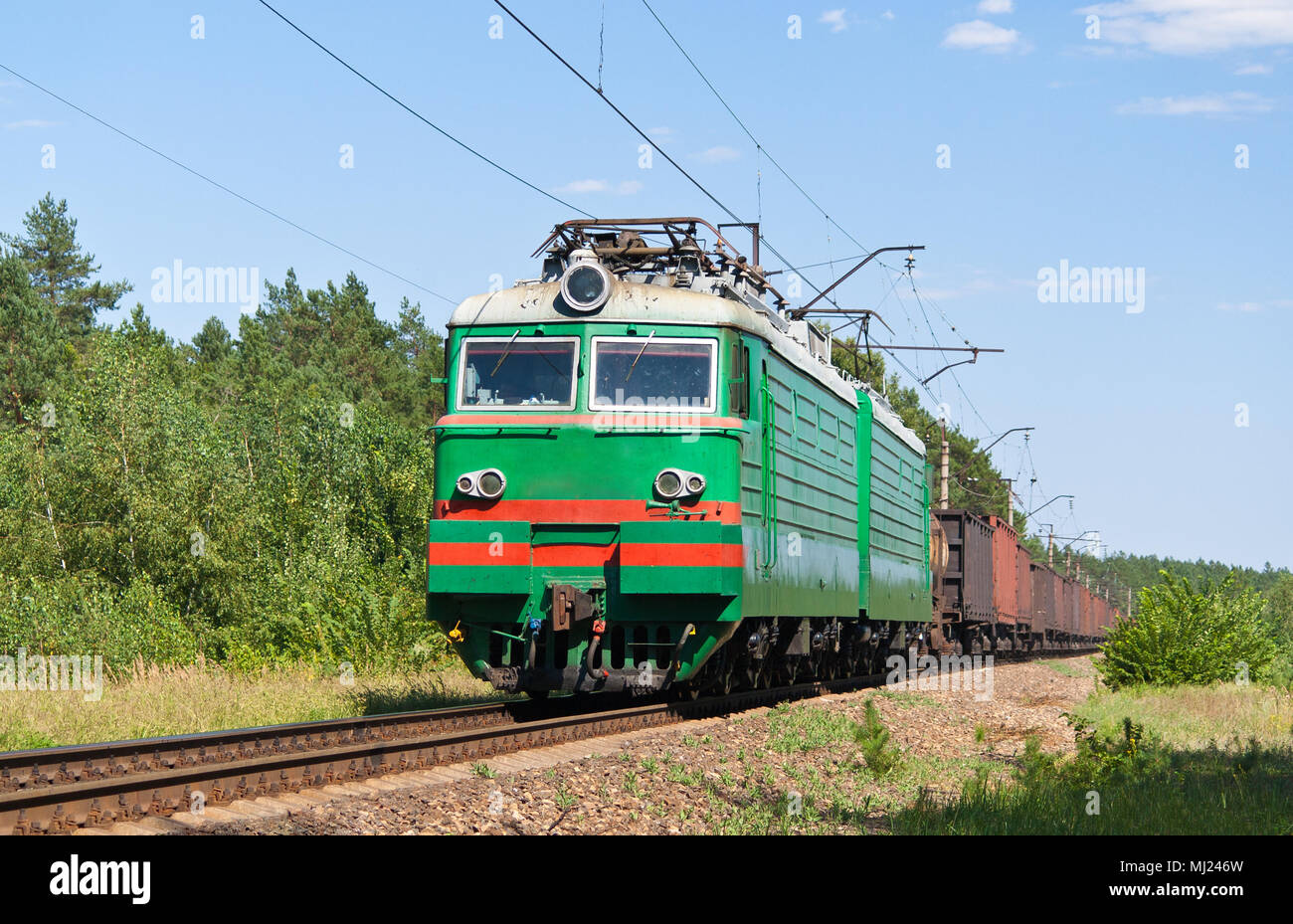 Freight train hauled by electric locomotive. Ukrainian railways Stock ...