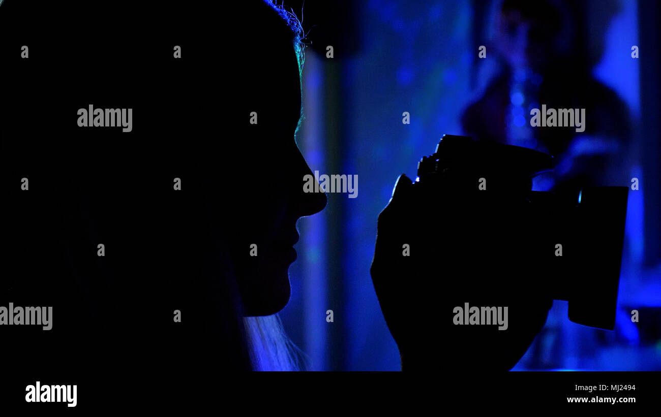 Spectator Girl Shooting On Camera Stock Photo - Alamy