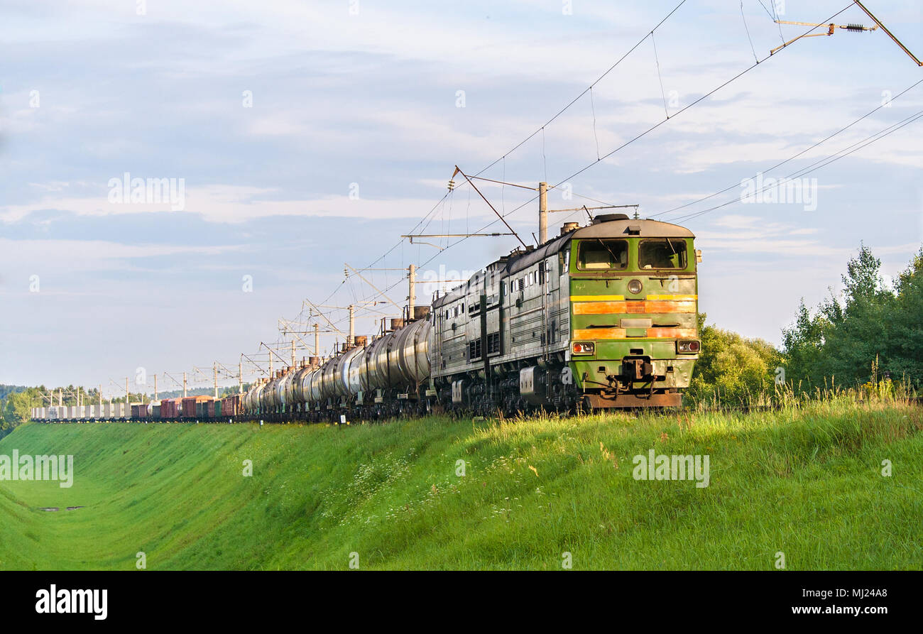 Freight train hauled by diesel locomotive. Belarusian railway Stock ...