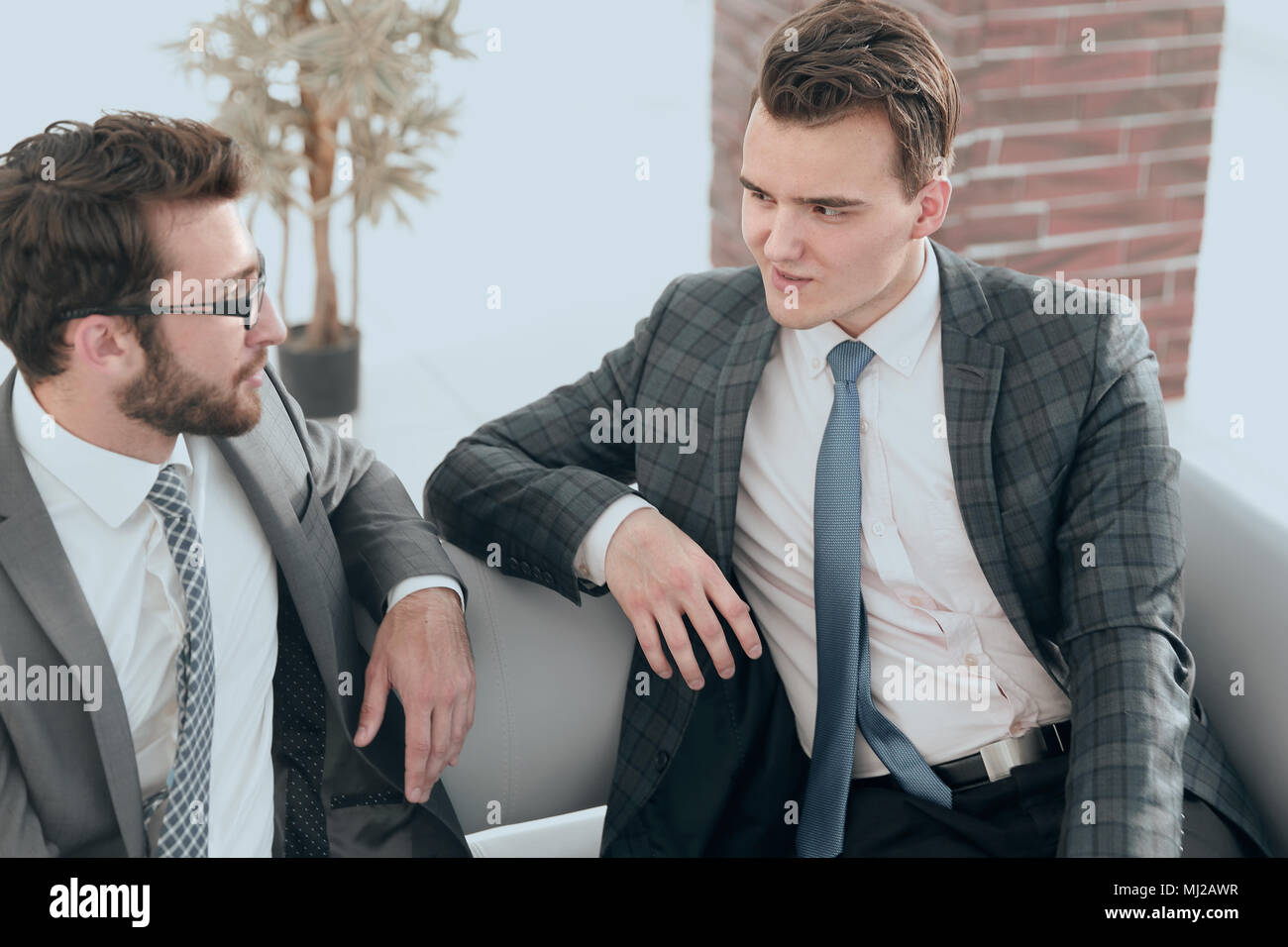 business partners talking at the office Stock Photo - Alamy