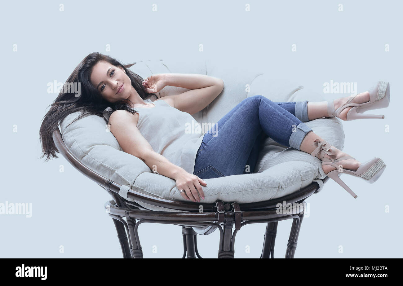 modern young woman relaxing in a round cozy soft chair Stock Photo - Alamy