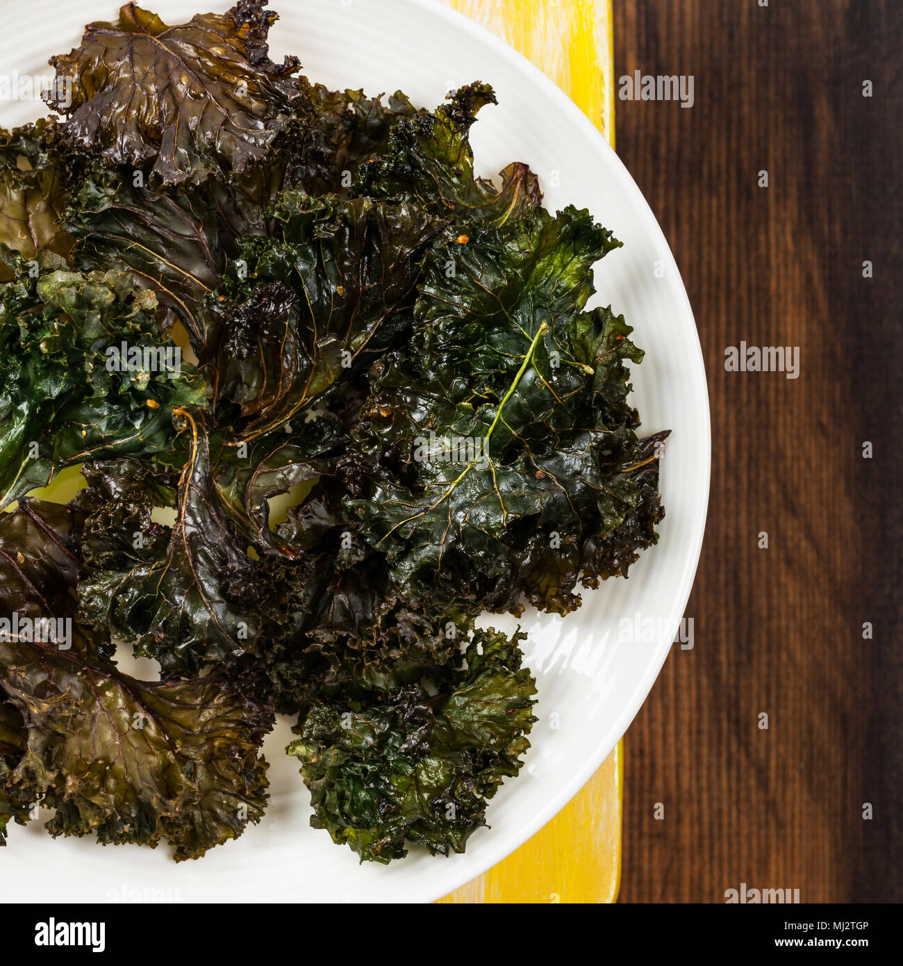 Baked Crispy Kale Chips Stock Photo - Alamy