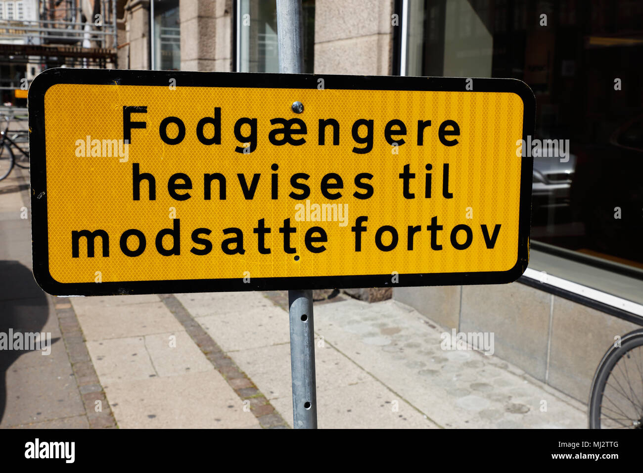 Danish sign in front of a construction site with an invitation for ...