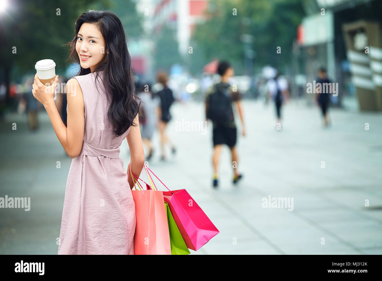 Young women go shopping shopping Stock Photo - Alamy