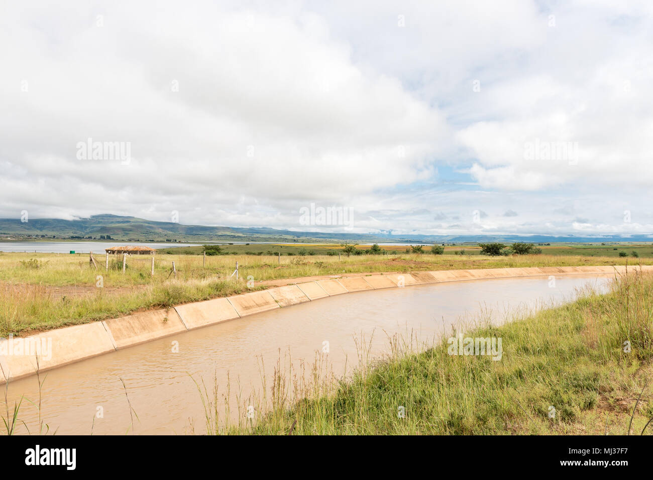 The Tugela-Vaal Water Scheme canal, built in 1995, at the Woodstock Dam ...