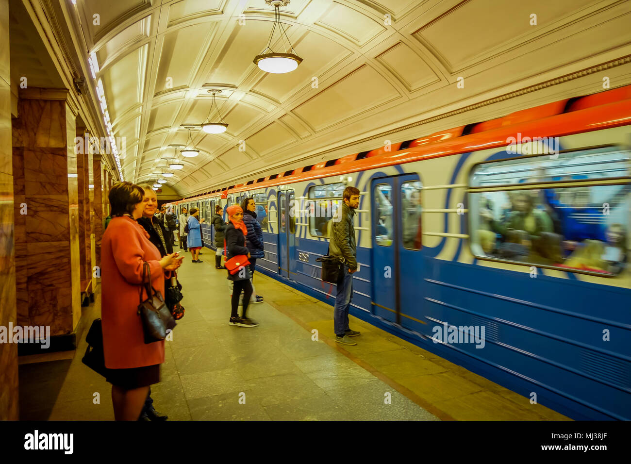 MOSCOW, RUSSIA- APRIL, 29, 2018: People waiting for underground train ...