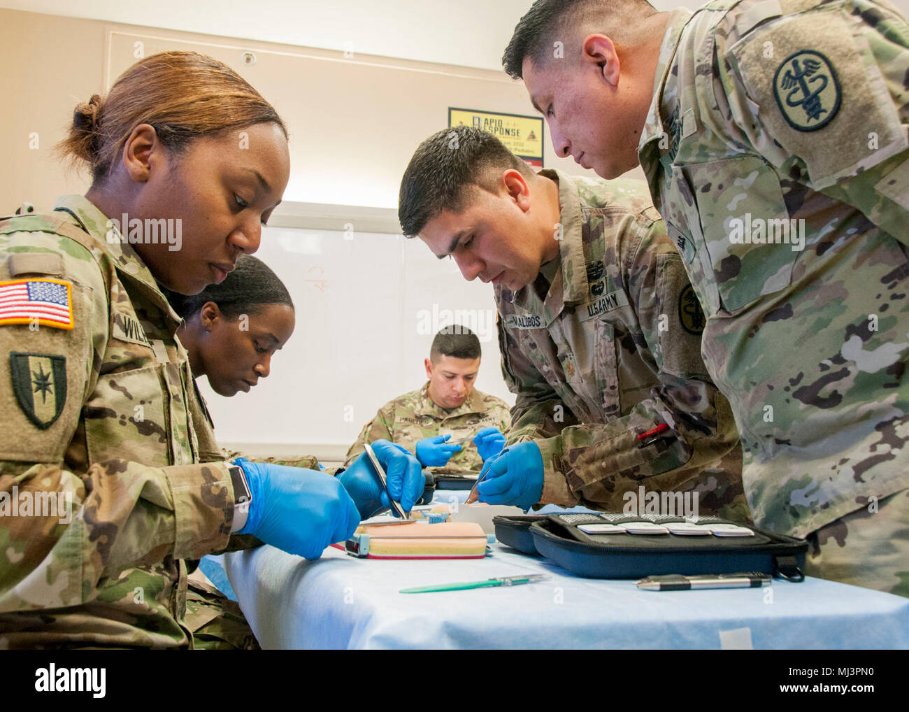 (From left) Officer Candidates Danielle Wilhight, Jessica Martin, and ...