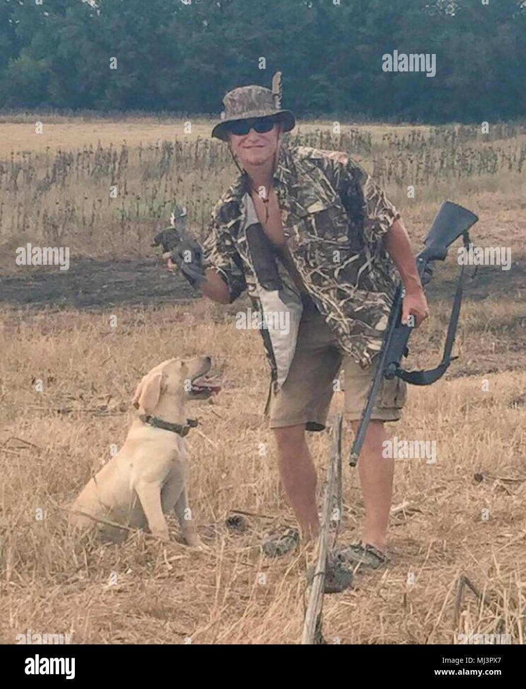 CAMP FOSTER, OKINAWA, Japan – Hunter Gullick poses for a photo with his ...