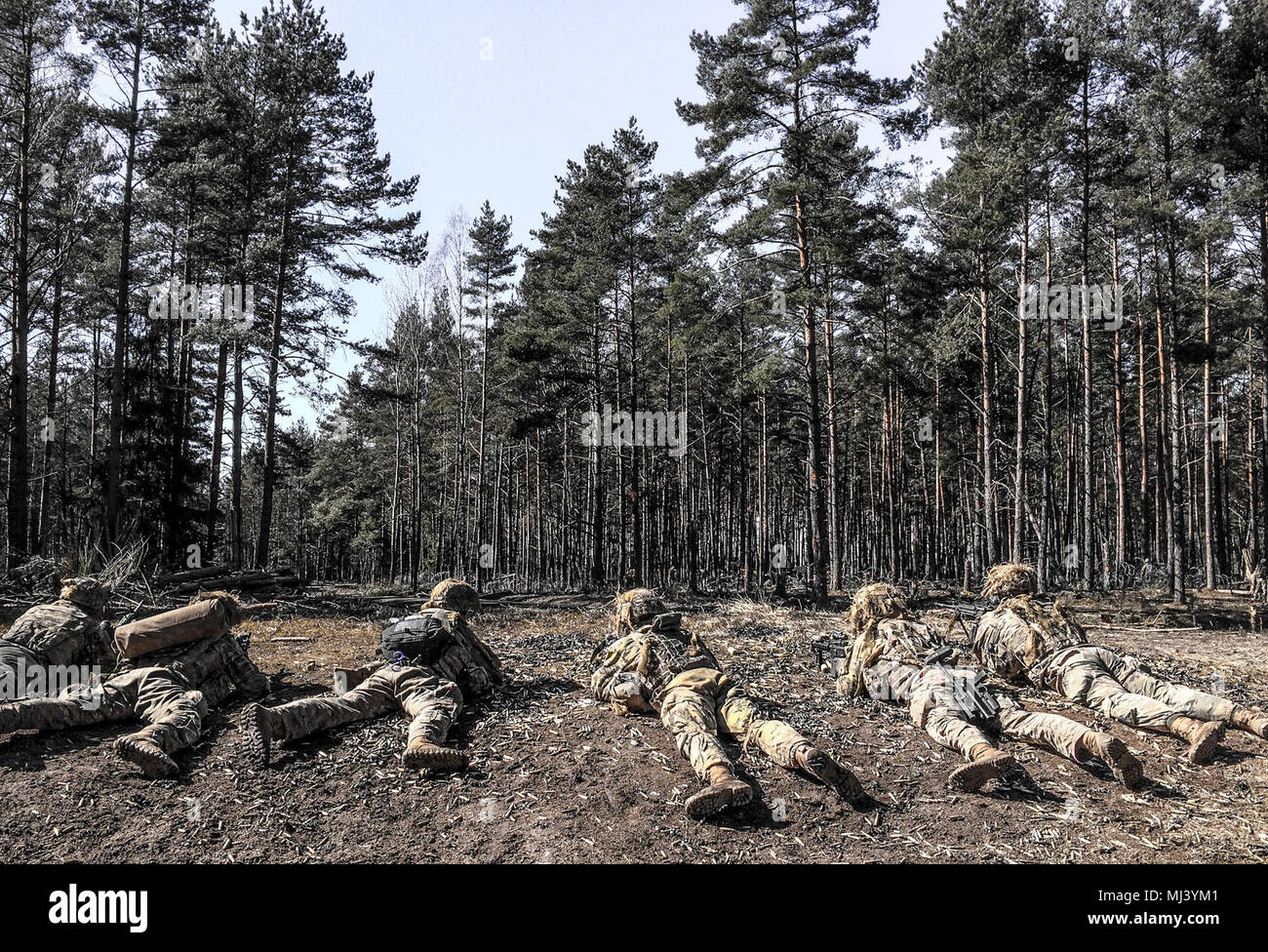 Paratroopers are pouring heavy fire into the enemy from a support by ...