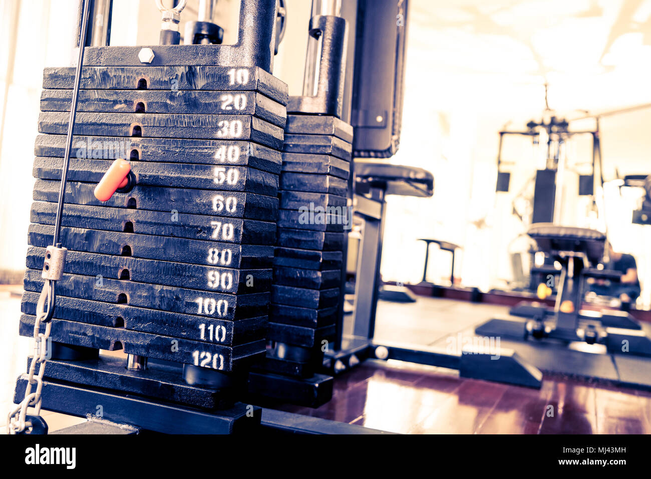 Metal Weight stack on Fitness training machine Stock Photo - Alamy