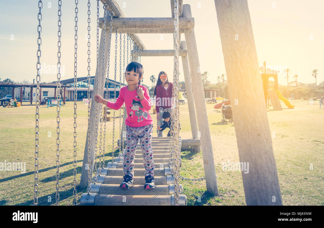 Family on Obstacle Playground Summer Camp Stock Photo - Alamy