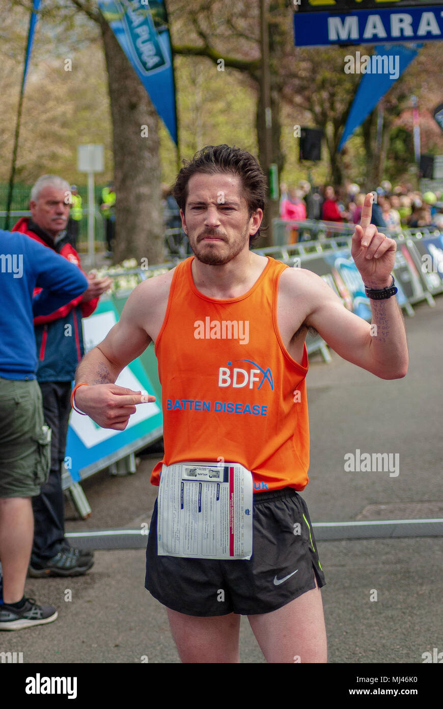 Michael Wright poses for photographers after finishing first at the ...