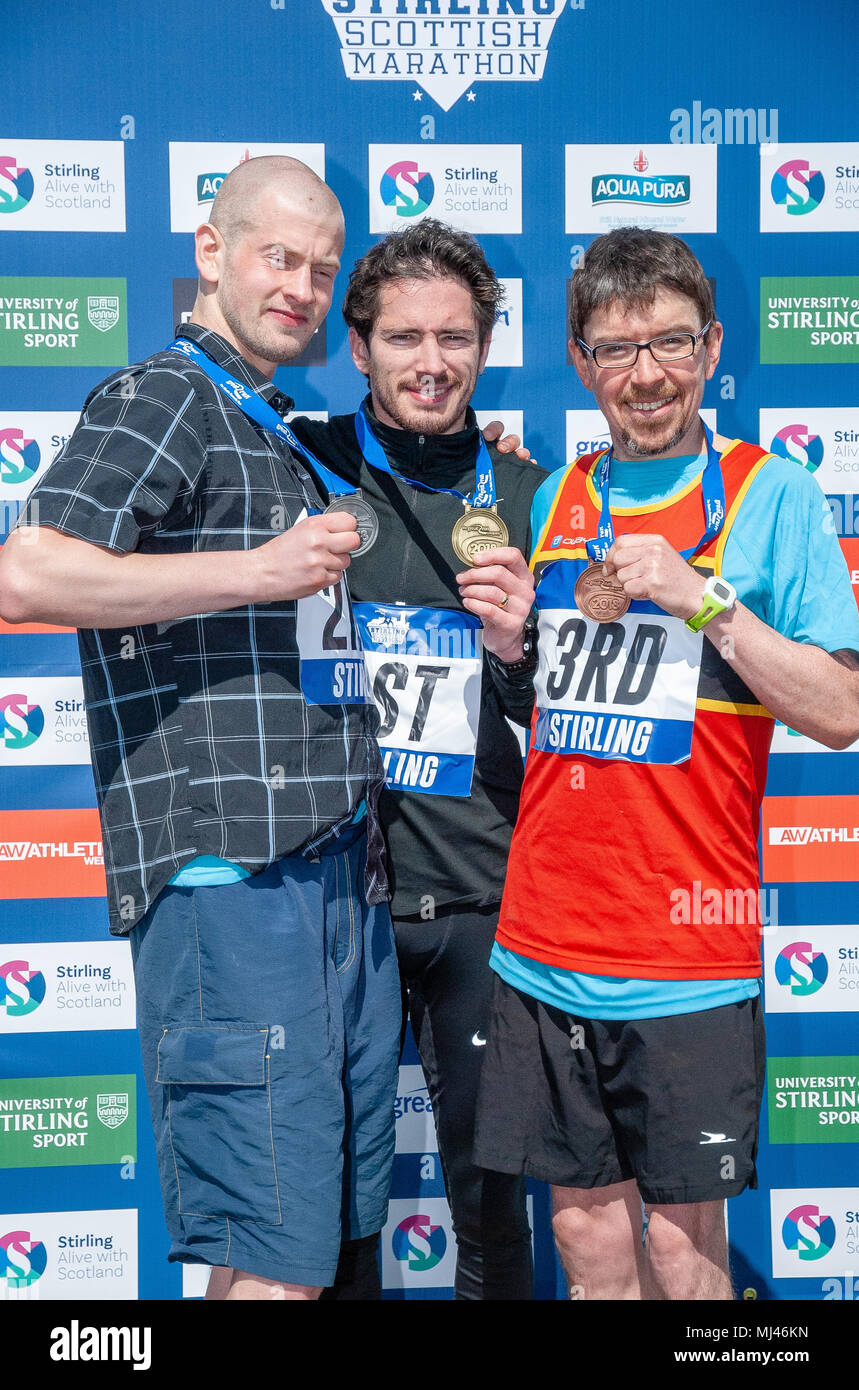 Michael Wright (C), Patryk Gierjatowicz (L) and Tom Roche (R) pose for ...