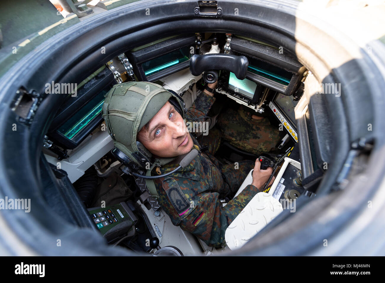19 April 2018, Germany, Munster: A Bundeswehr commander sitting in a ...