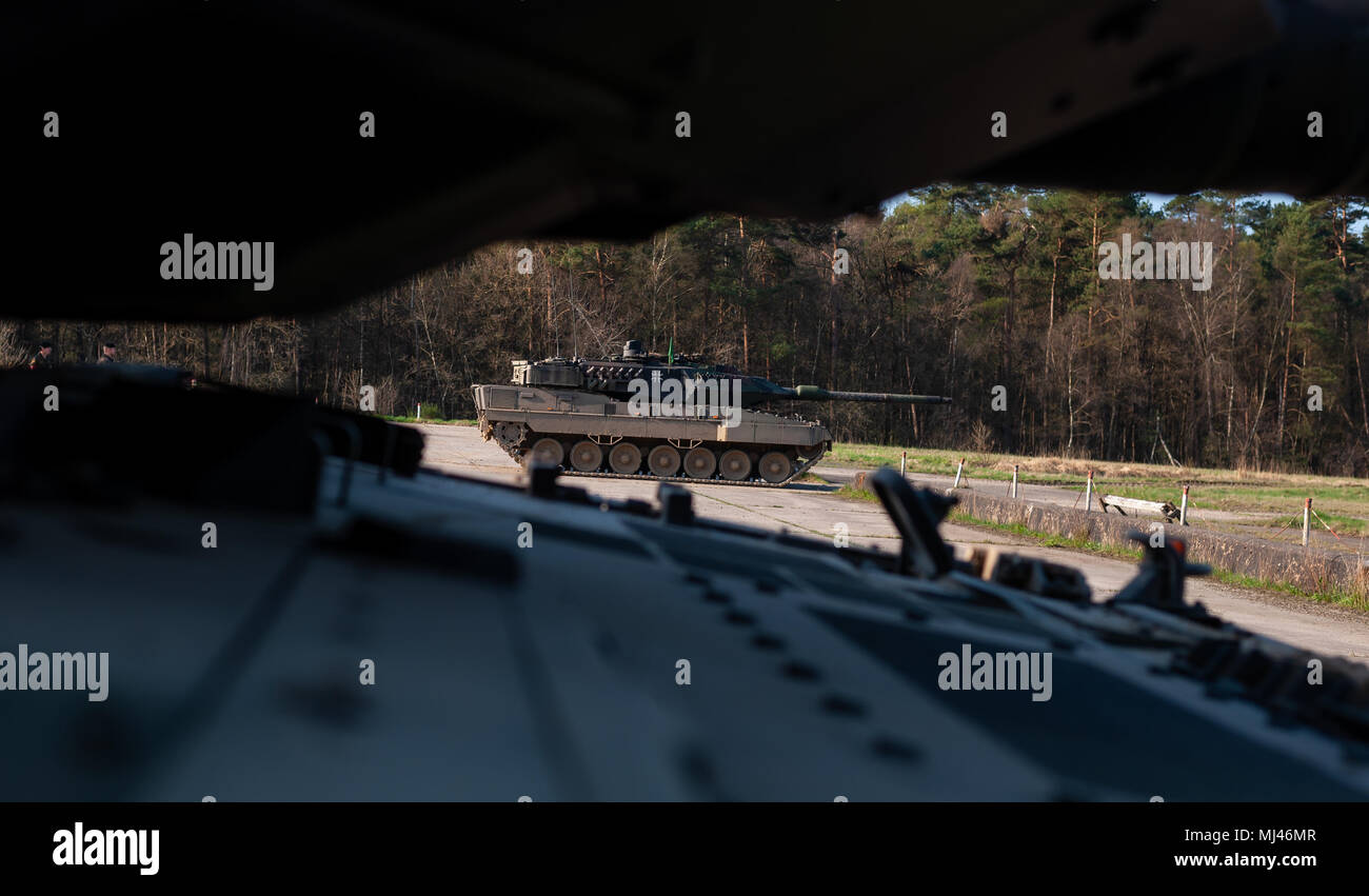19 April 2018, Germany, Munster: Two Leopard 2 A7 tanks at the Munster ...