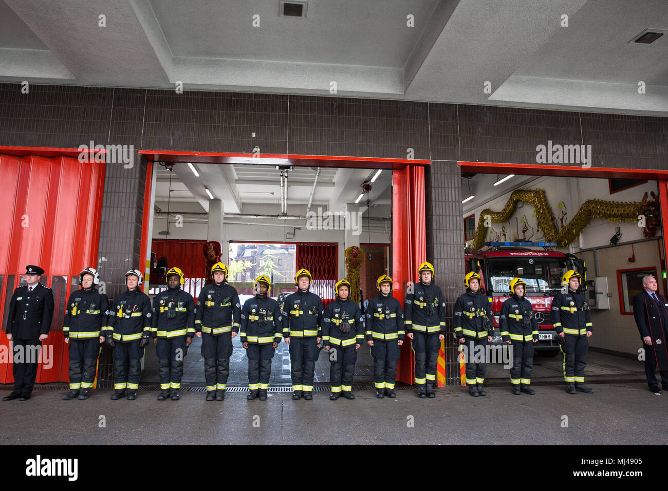 London, UK. 4th May, 2018. London Fire Brigade firefighters honour the ...