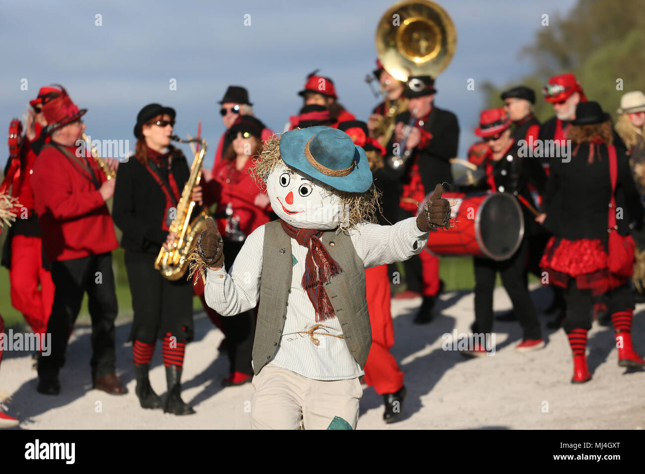 Wray, UK. 4th May, 2018. A band leads a parade of people dressed up as ...