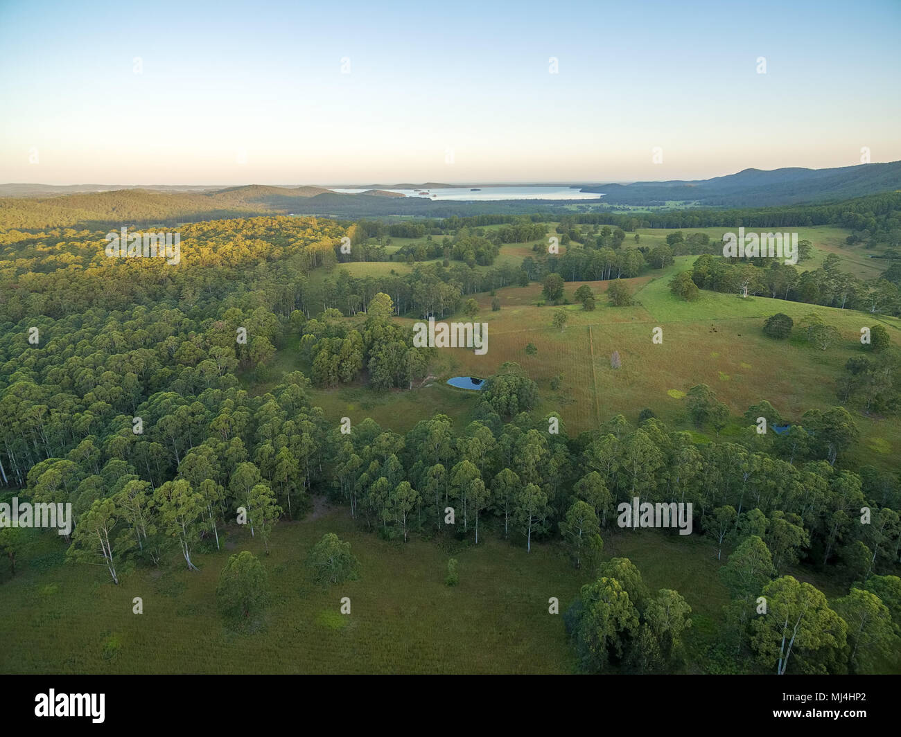 Aerial view green countryside meadows dawn hi-res stock photography and ...