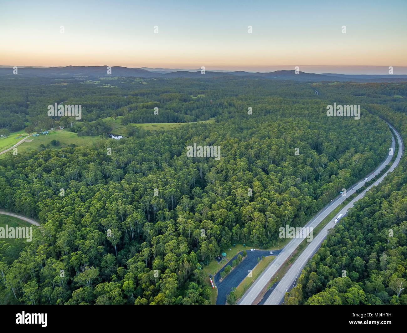 Pacific Highway and native Australian forest at sunset Stock Photo - Alamy