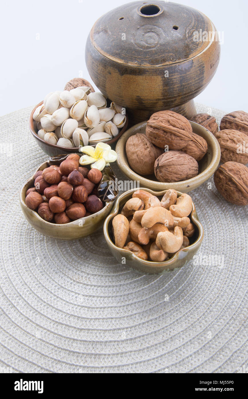 nuts. mixed nuts on background Stock Photo - Alamy
