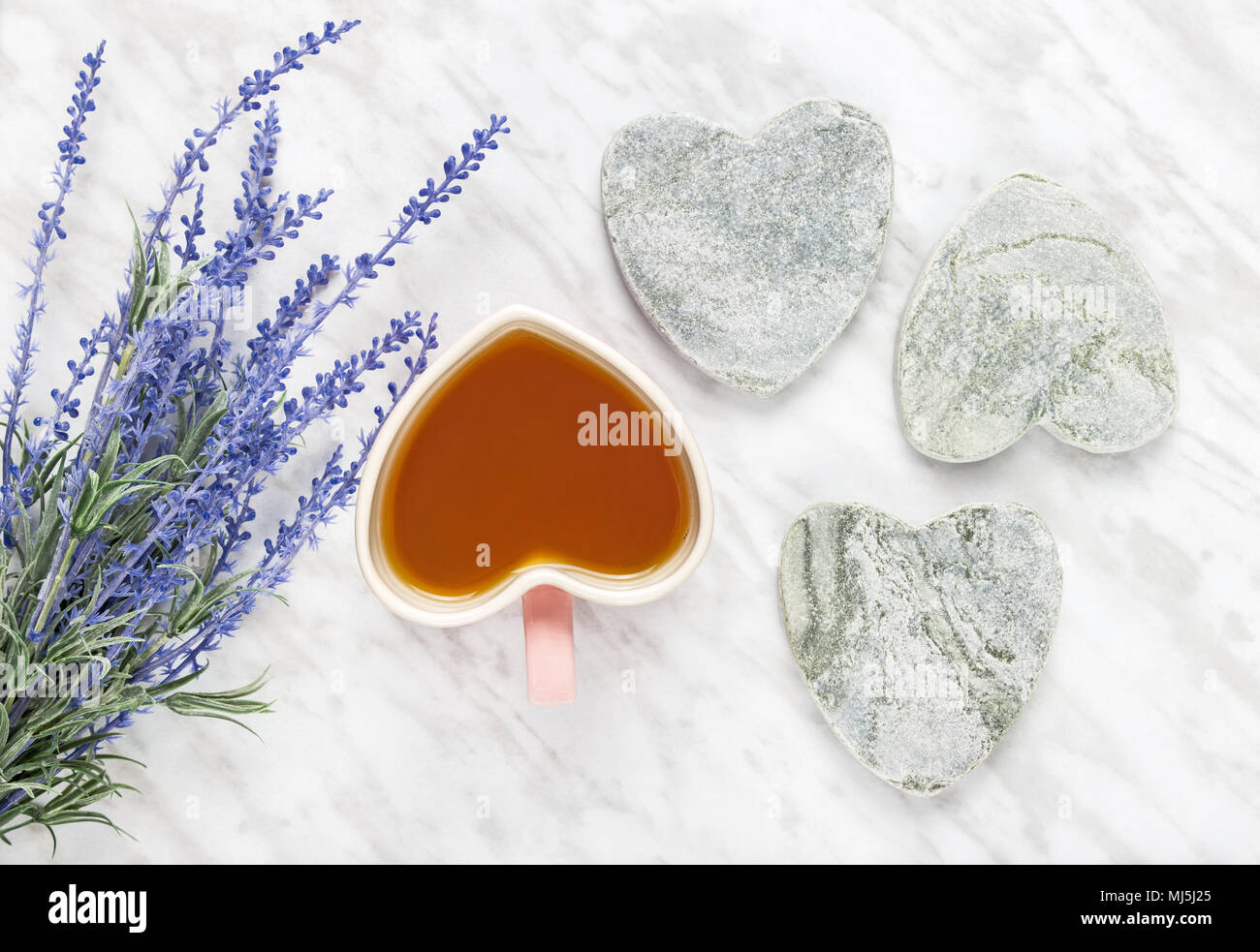 Cup of flavored tea and blue lavender. Love for tea. Flat lay ...
