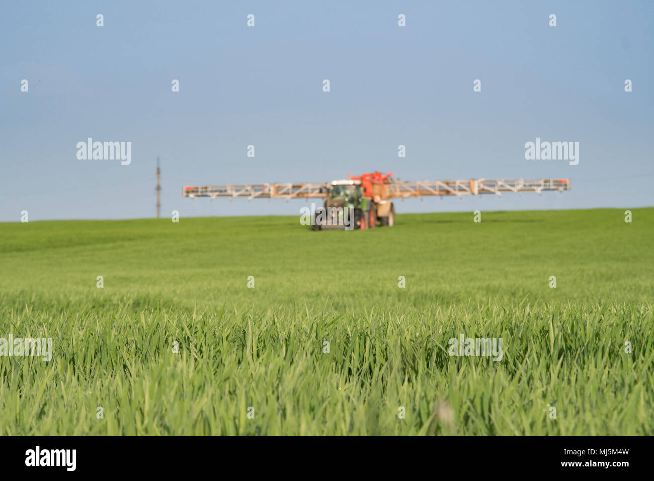 Agriculture tractor spray farm field hi-res stock photography and ...