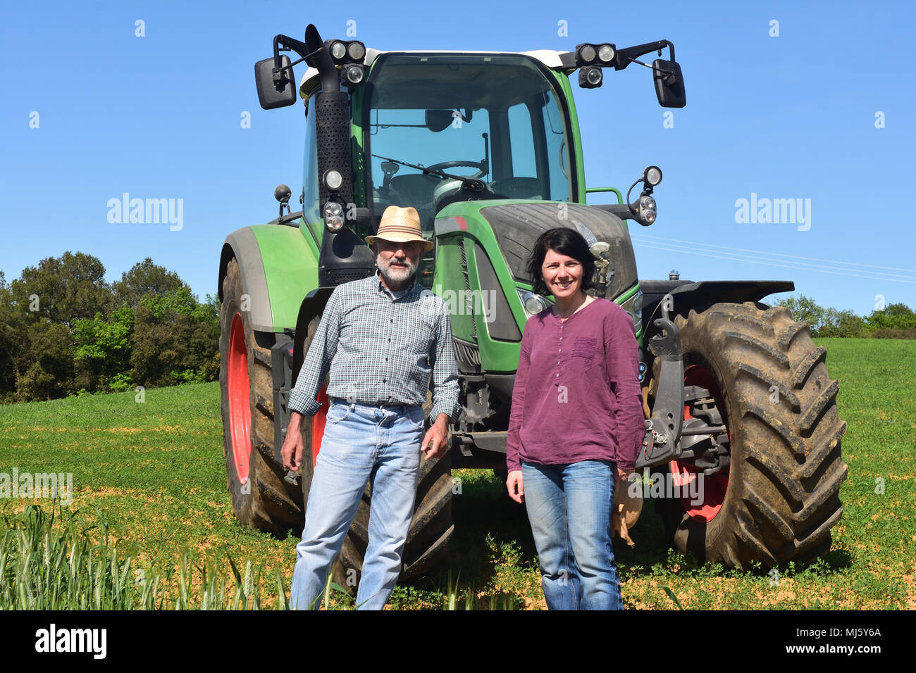 Couple On A Tractor High Resolution Stock Photography and Images - Alamy