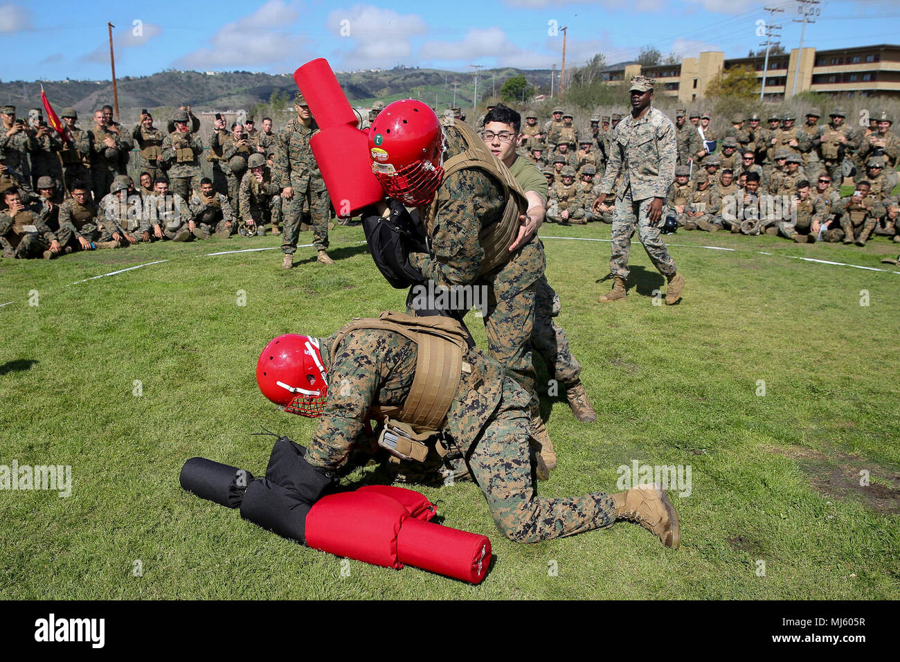 A U.S. Marine, bottom, with 1st Combat Engineer Battalion (CEB), 1st ...
