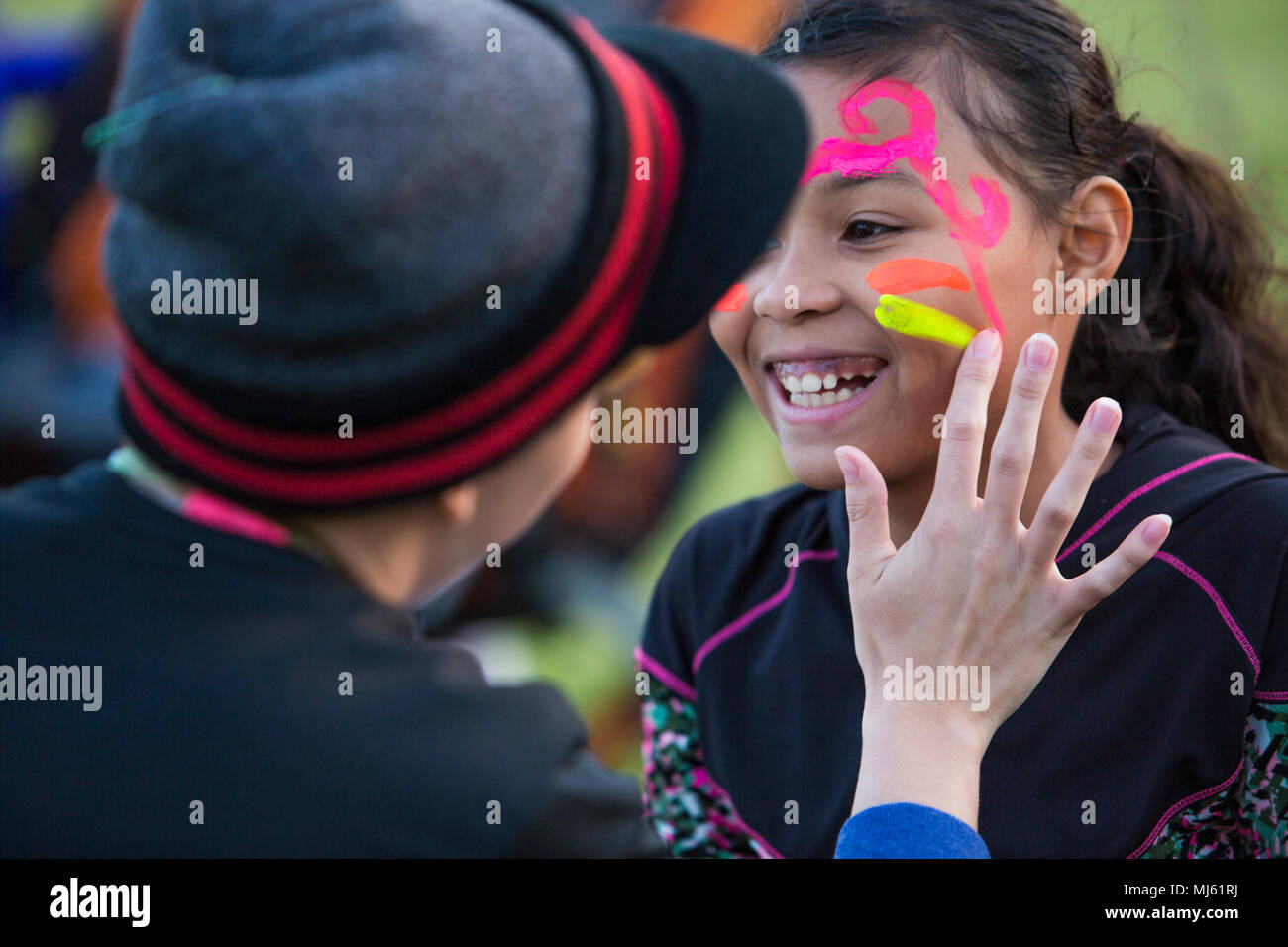 CAMP LESTER, OKINAWA, Japan – A participant gets her face painted ...