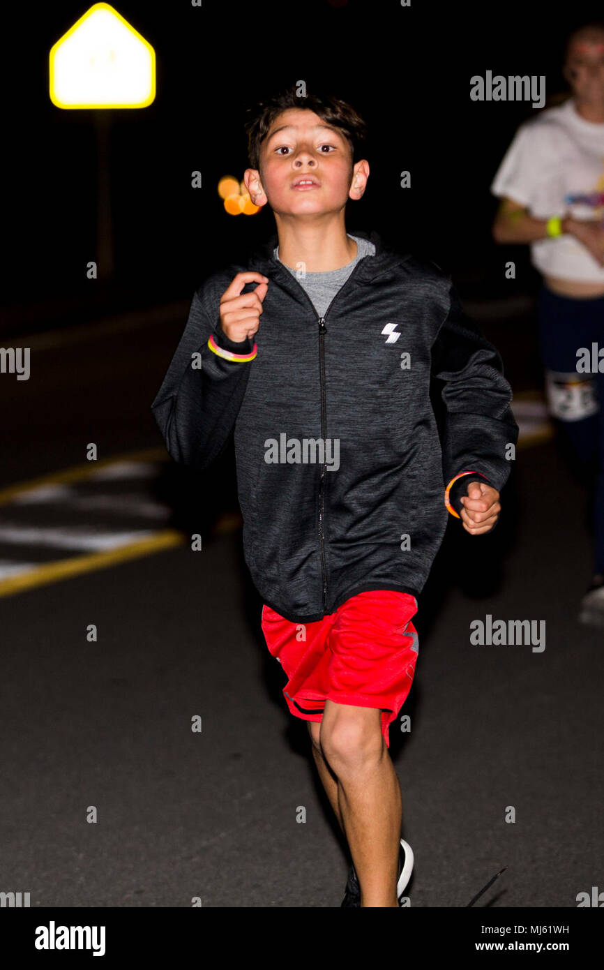 CAMP LESTER, OKINAWA, Japan – A participant races against the clock ...