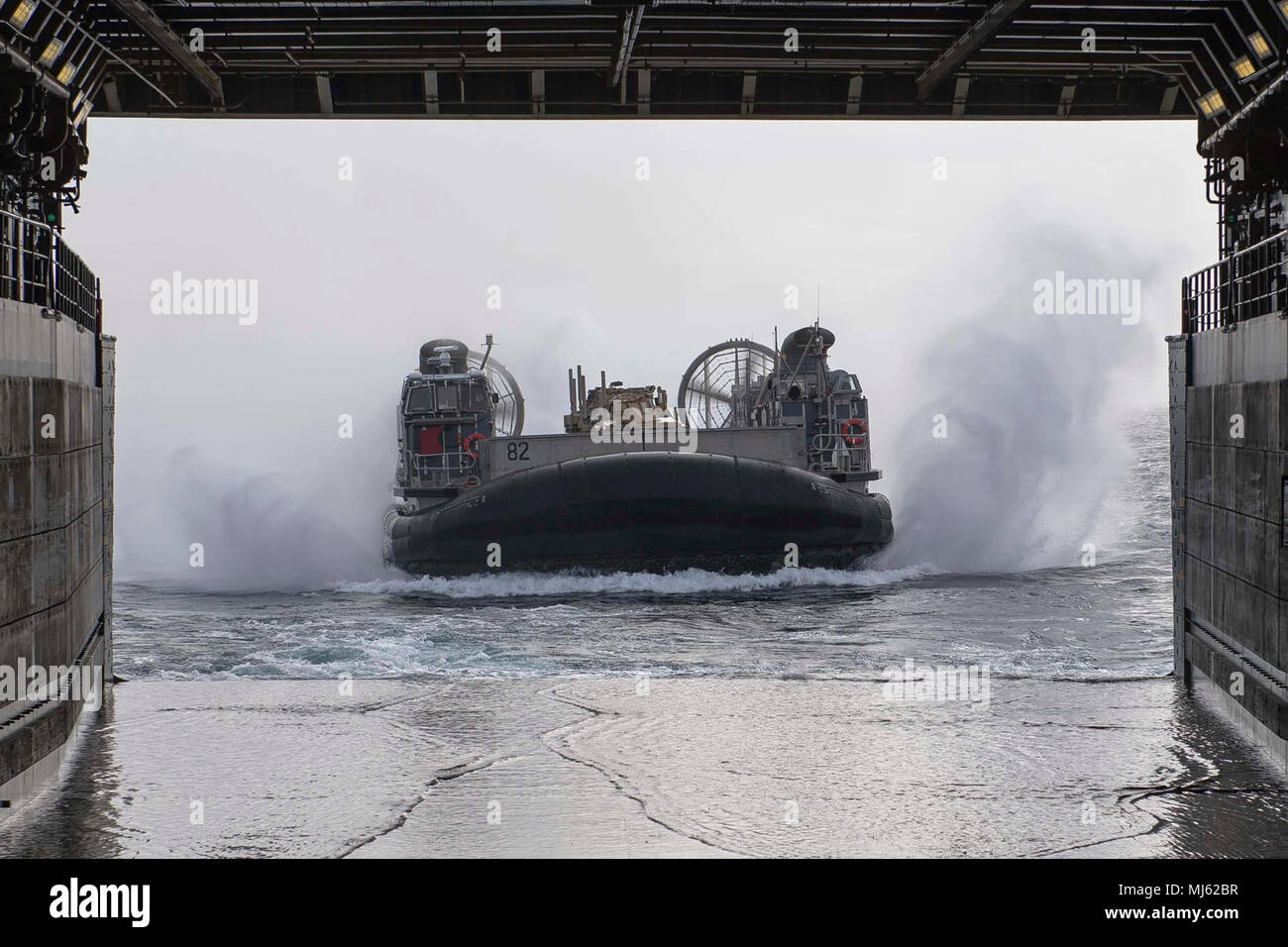 U.S. Navy landing craft, air cushion (LCAC) 82 attached to Assault ...
