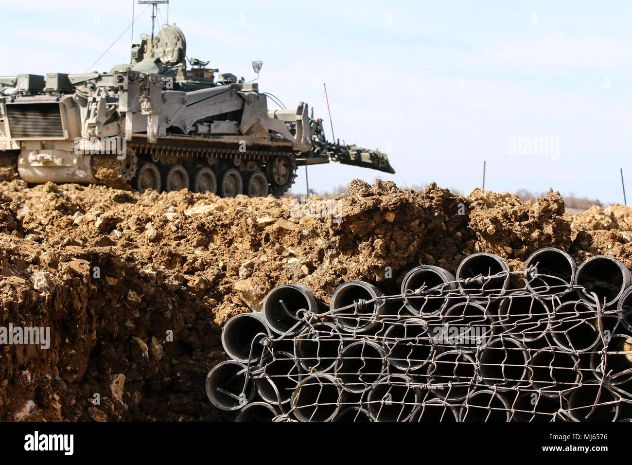 A "Terrier" armored digger from the United Kingdom's 22nd Engineer ...