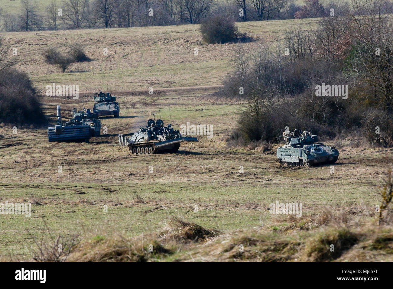 M2 Bradley fighting vehicles with the U.S. Army’s 2nd Armored Brigade ...