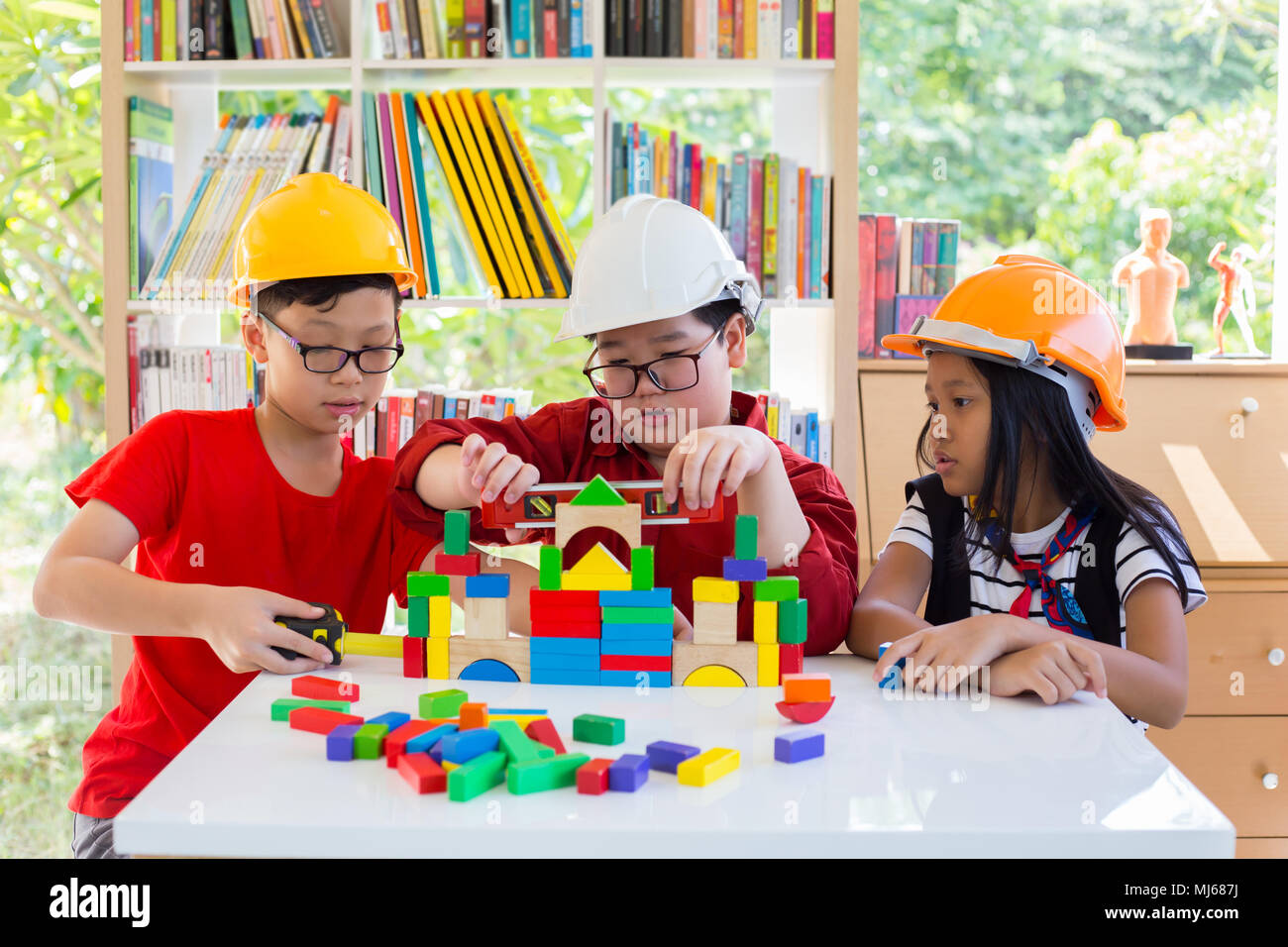 Asian kids playing indoor hi-res stock photography and images - Alamy