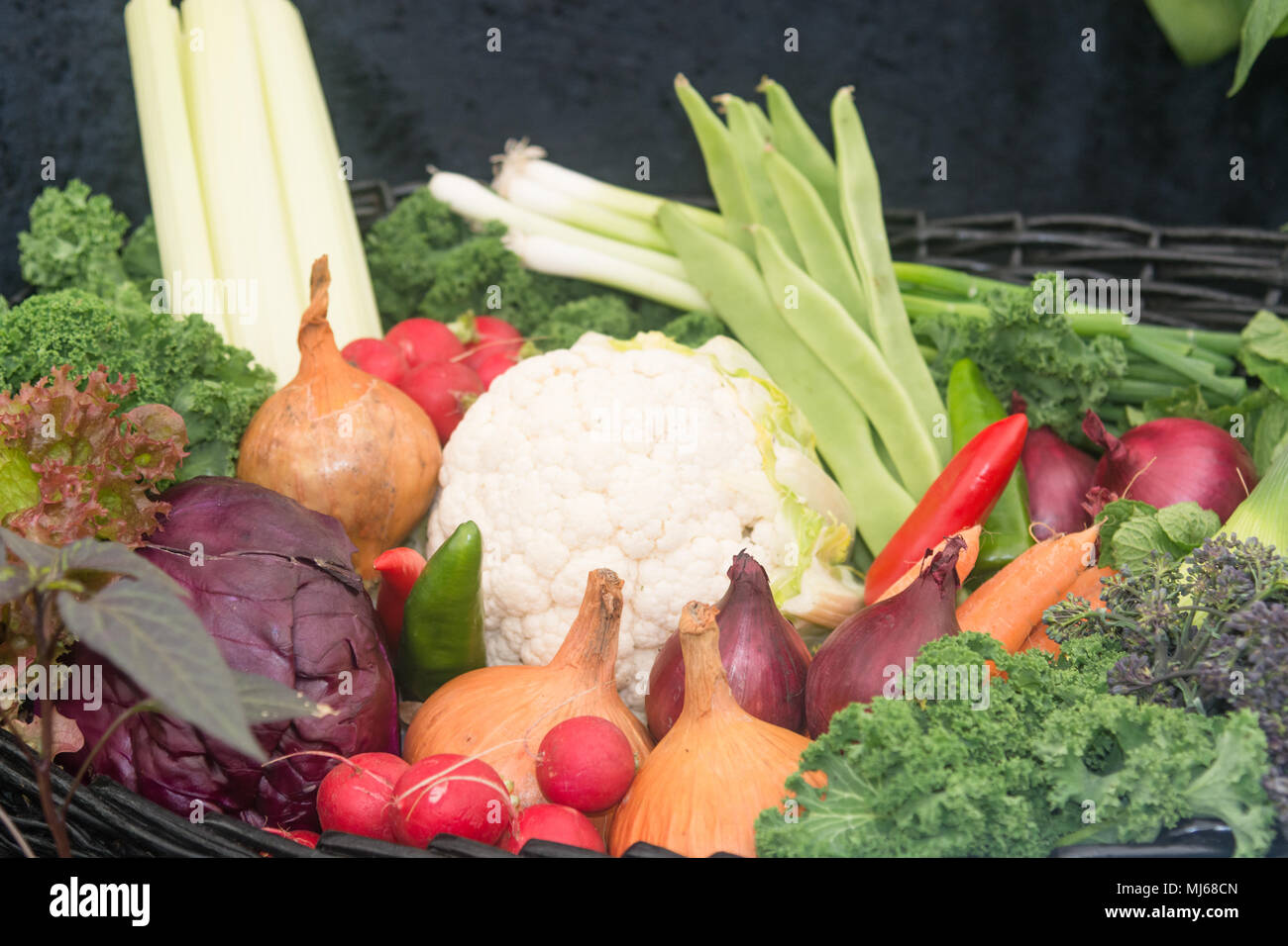 Selection of vegetables in a basket Stock Photo - Alamy