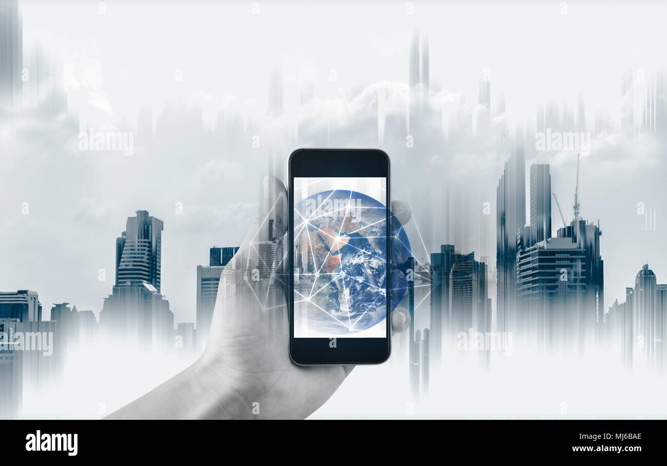 Hand using mobile smartphone with global network connection. Mobile ...