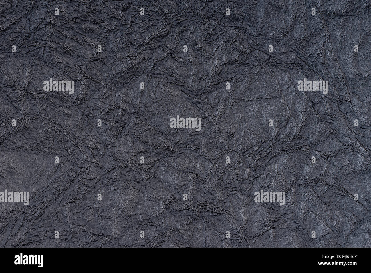 Black self made paper pressed sheet texture background. Embossed lace ...