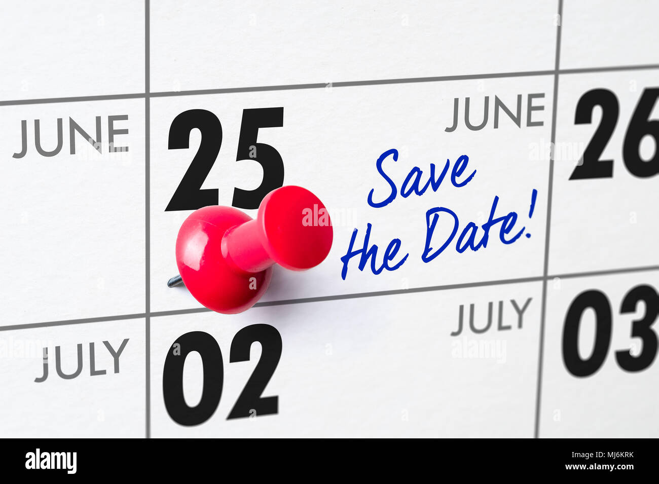 Wall calendar with a red pin - June 25 Stock Photo - Alamy